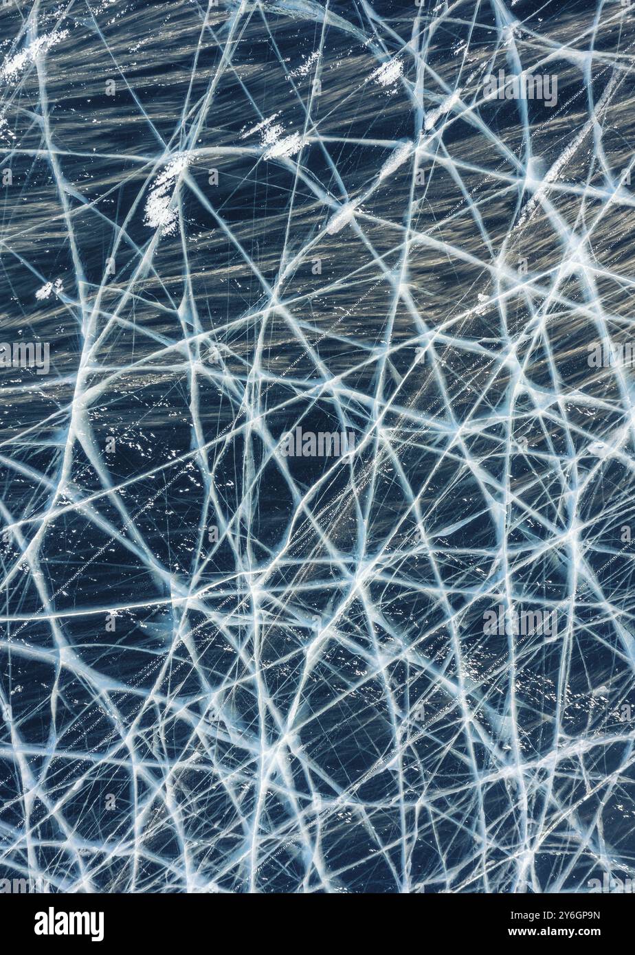 Aerial top view of frozen Lake Baikal. Blue transparent clear smooth ...