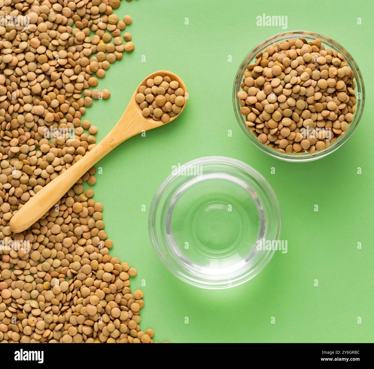 Organic brown lentils to soak in water - Lens culinaris Stock Photo - Alamy