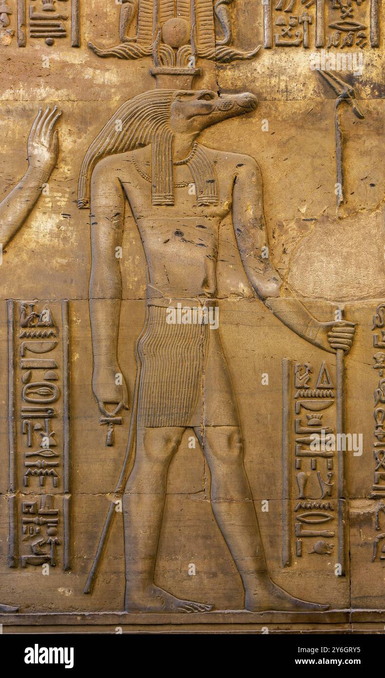 Hieroglyphic carvings of Sebek god on the exterior walls of an ancient ...