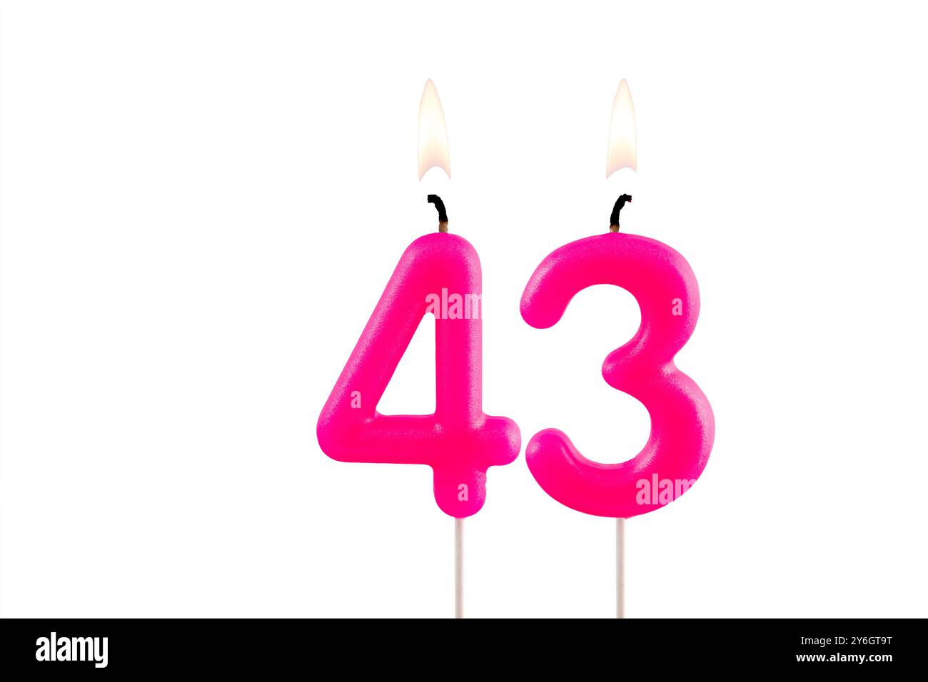 Pink number 43 birthday candle on white background Stock Photo - Alamy