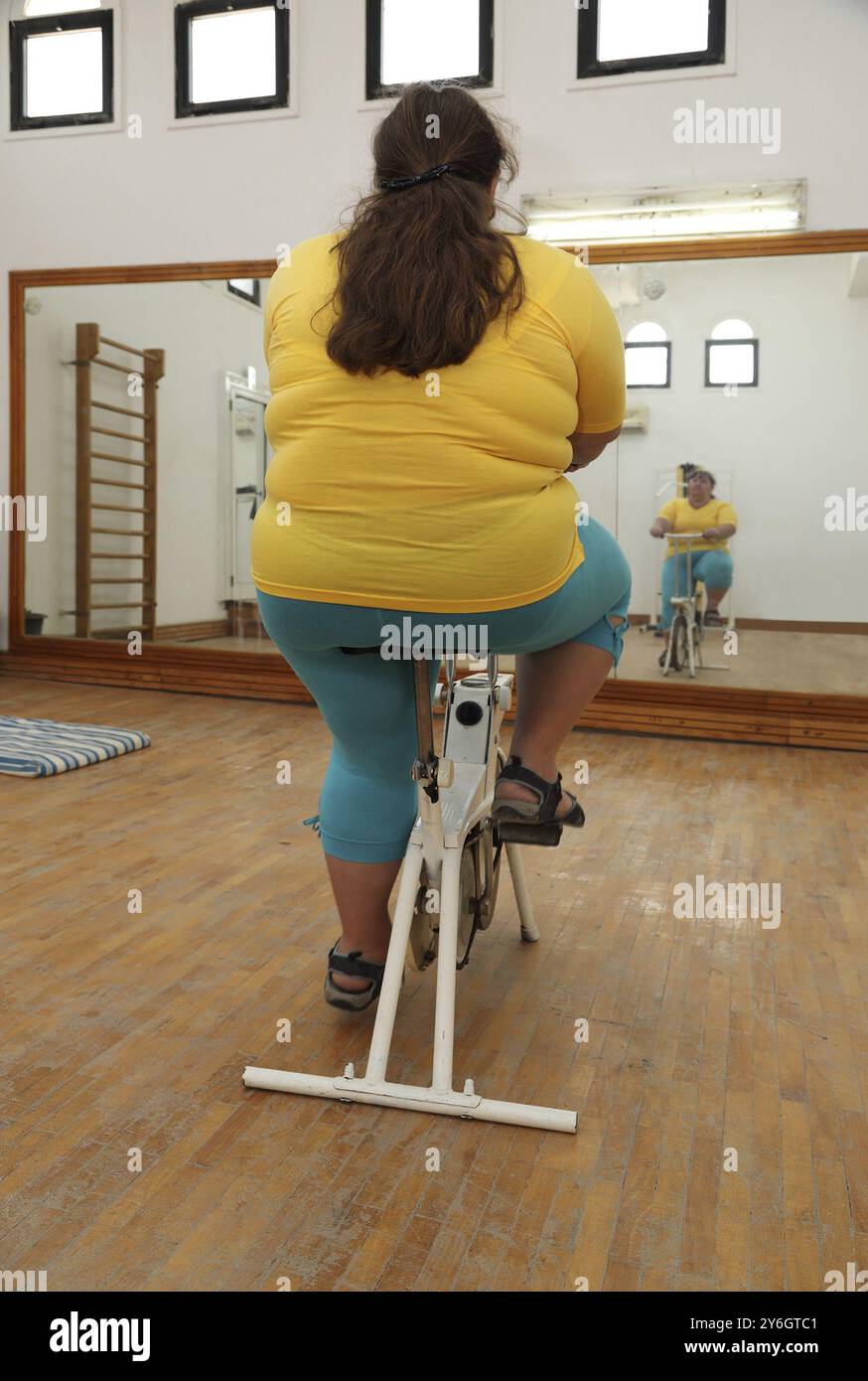Fat woman on bike hi-res stock photography and images - Alamy