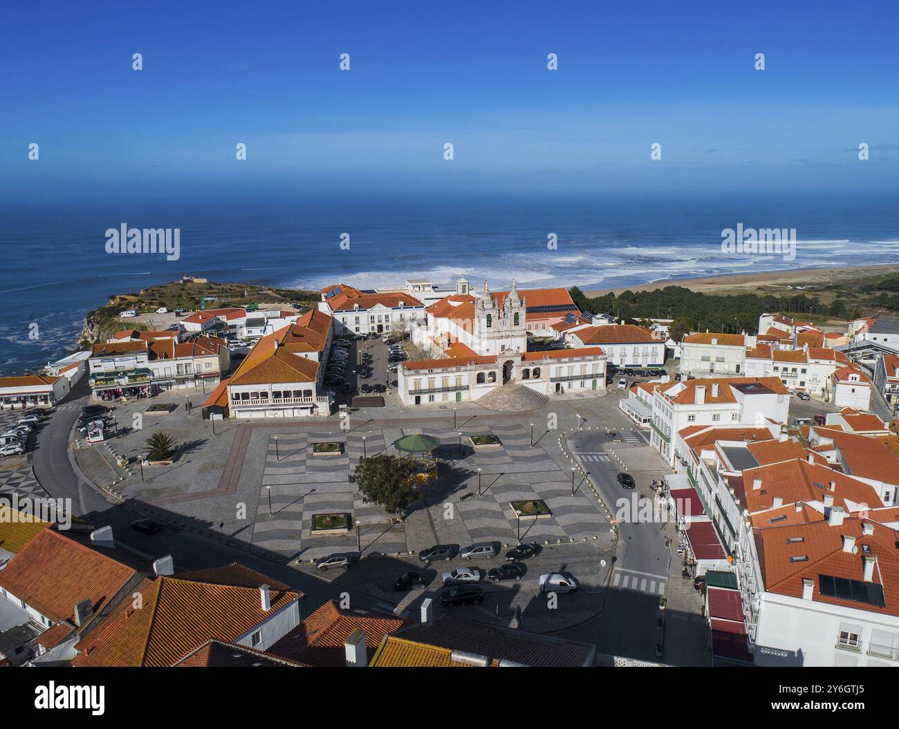 Aerial view of houses and Church of Nossa Senhora da Nazare on the ...