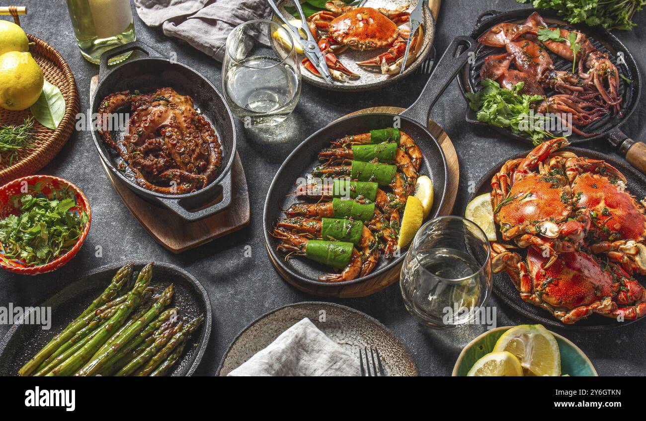 Food, Set table with seafood dishes, cooked crabs, tiger shrimps ...