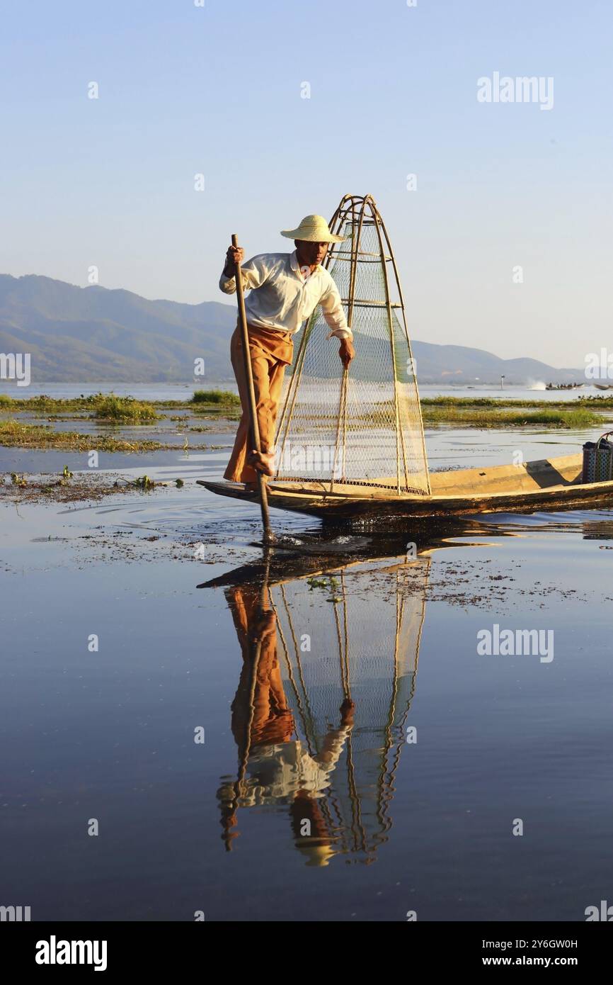Myanmar travel attraction landmark, Traditional Burmese fisherman with ...