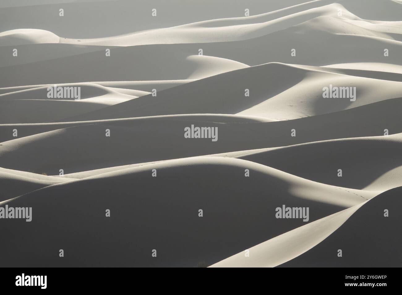 Background with beautiful structures of sandy dunes at sunrise in the ...