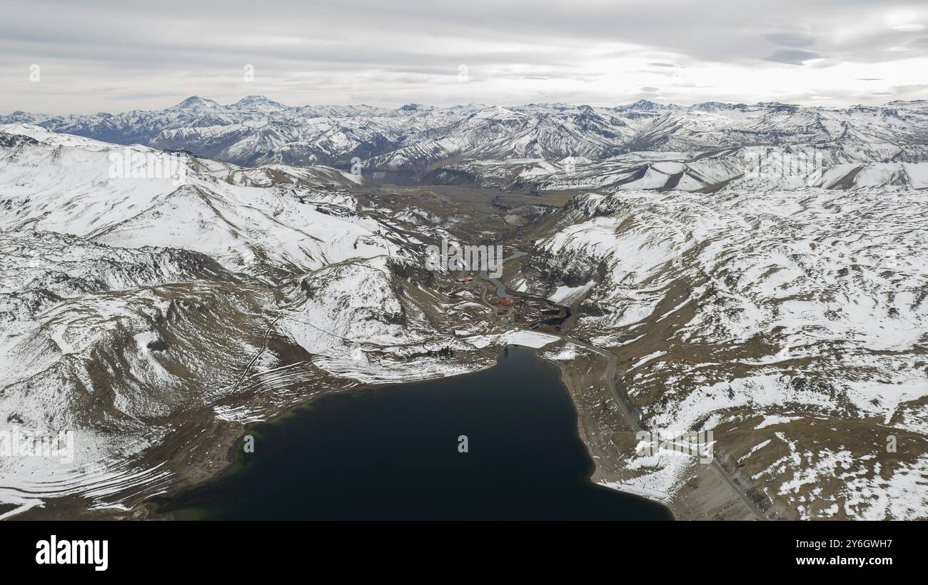 Aerial view of the Snowy Andes and Maule Lagoon at the Pehuenche border ...