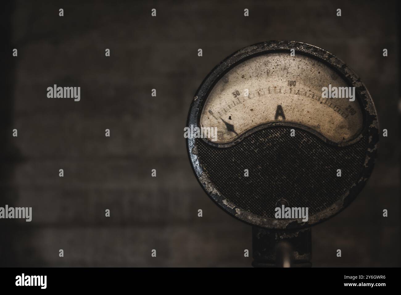 Close-up of Electrical old and worn out industrial current meter ...