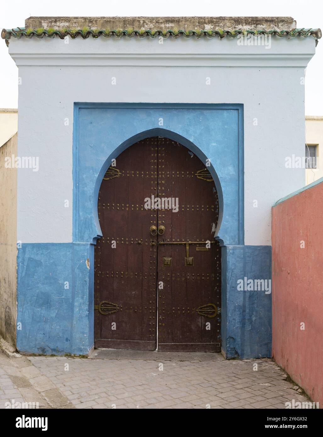 Traditional color entrance gate with door in Fes, Morocco, Africa Stock ...