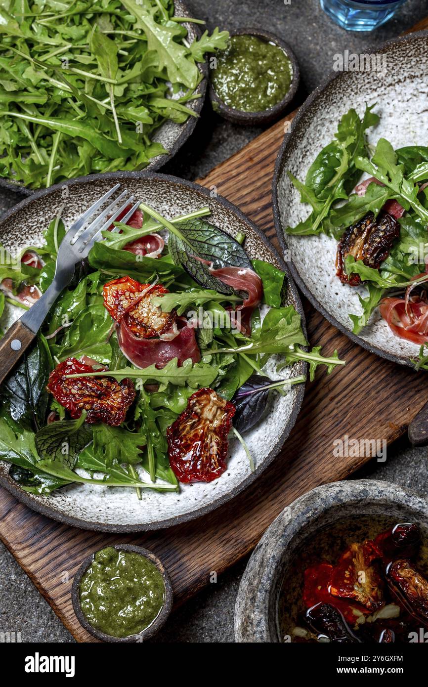 Food, Salad with arugula, spinach, dried tomato and ham serrano paleta ...