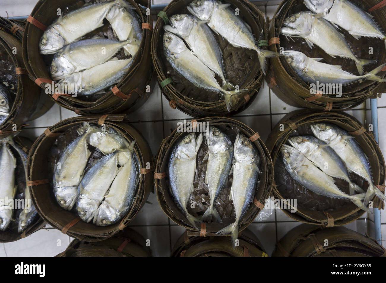 Mackerel fish in bamboo basket at market, Thailand, Asia Stock Photo ...