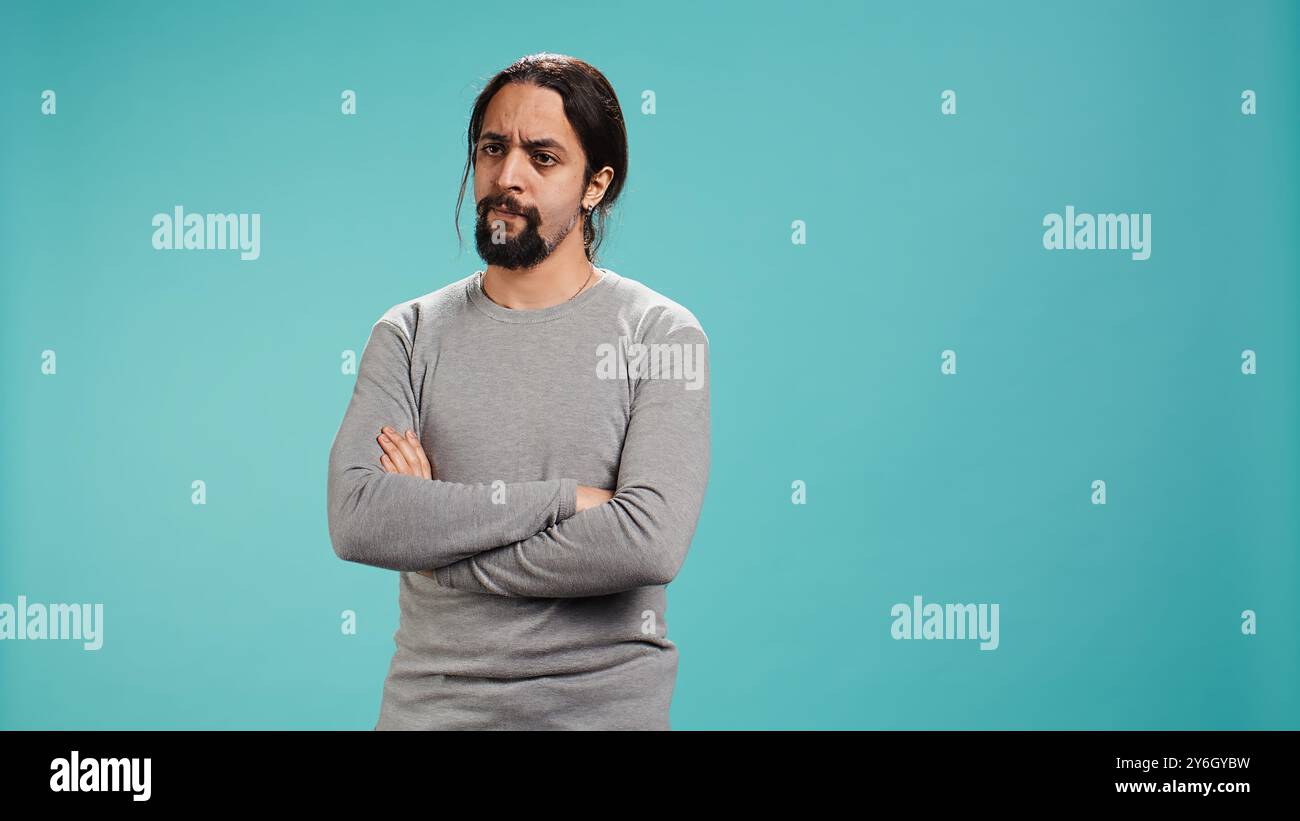 Man shakes head, showing negative emotion, showing lack of satisfaction ...