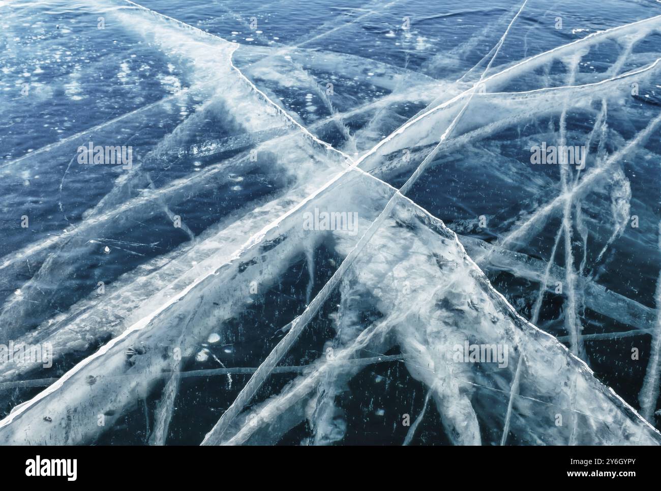 Frozen Lake Baikal background. Blue transparent clear smooth ice with ...