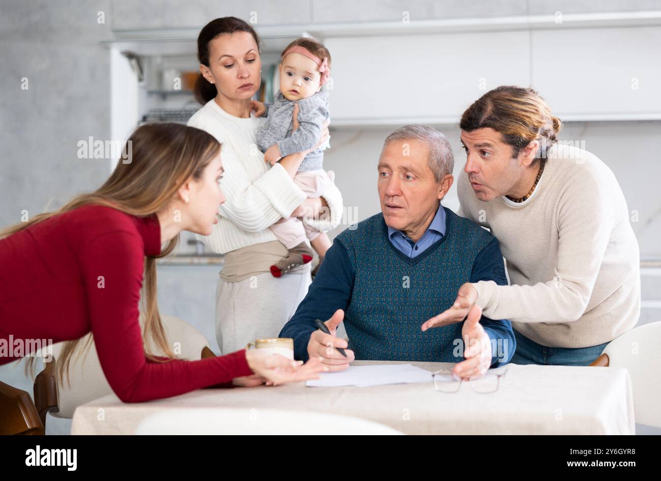 Family members discussing inheritance Stock Photo - Alamy