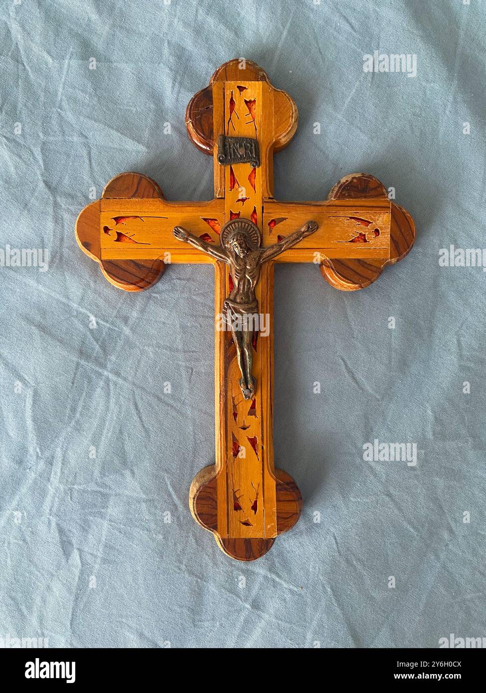 Crafted wooden crucifix with a detailed metal figure of Jesus Christ ...