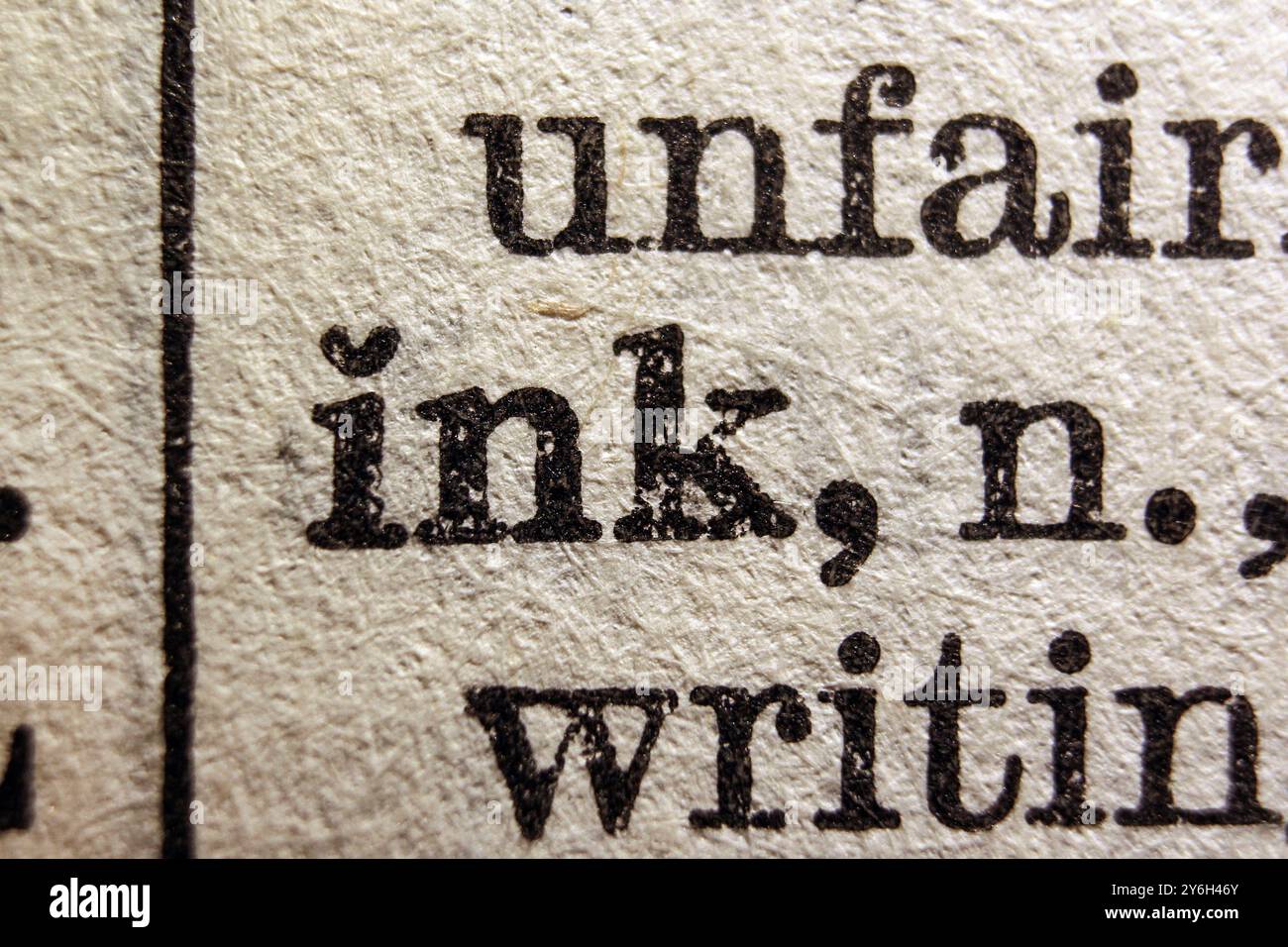 Word ink on dictionary page, macro close-up Stock Photo - Alamy
