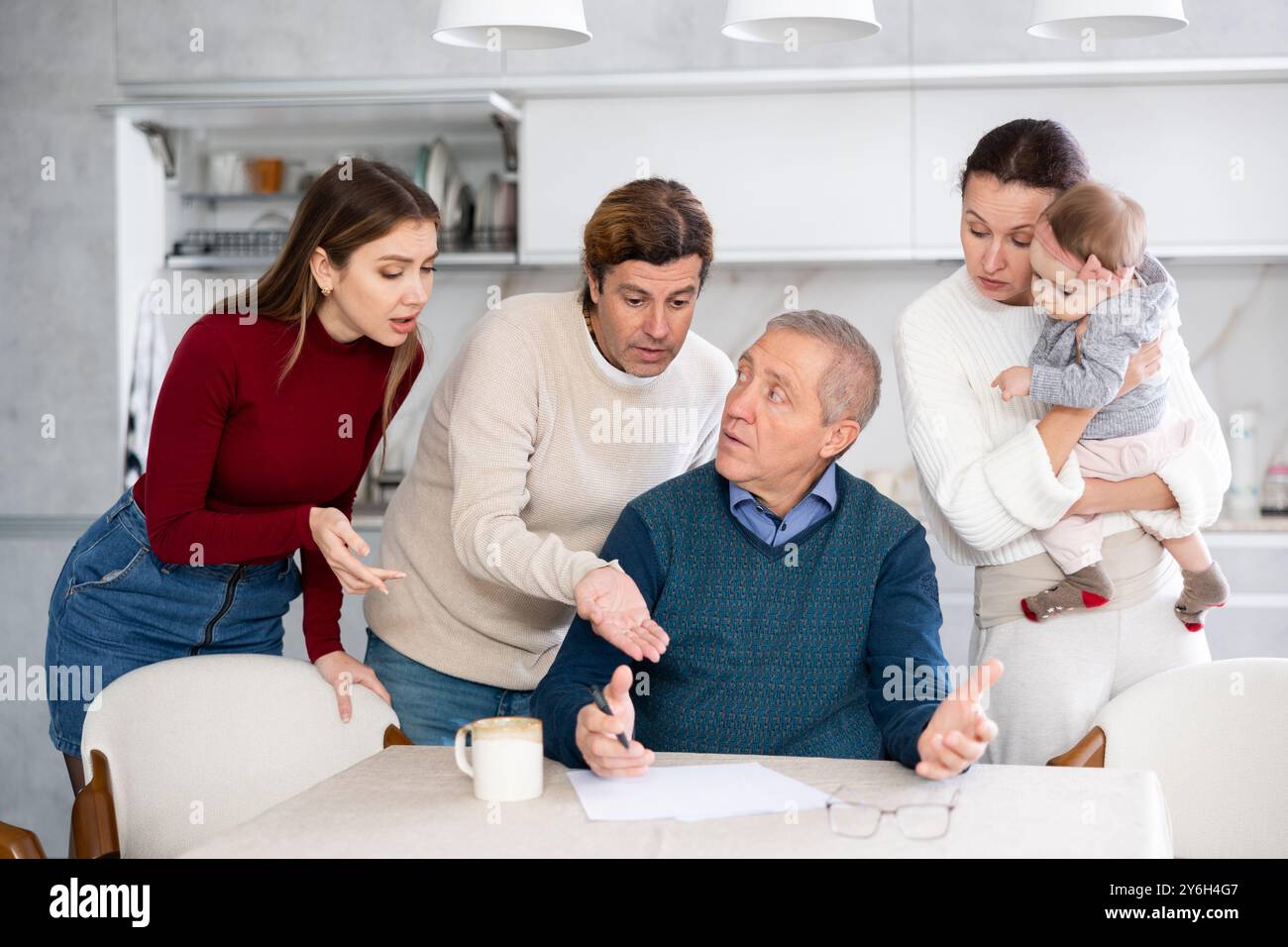 Family members discussing inheritance Stock Photo - Alamy