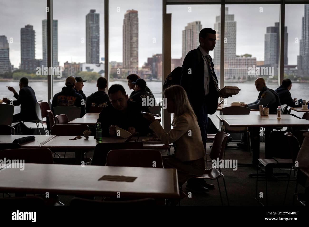 People in the cafeteria during lunch at the United Nations Headquarters ...
