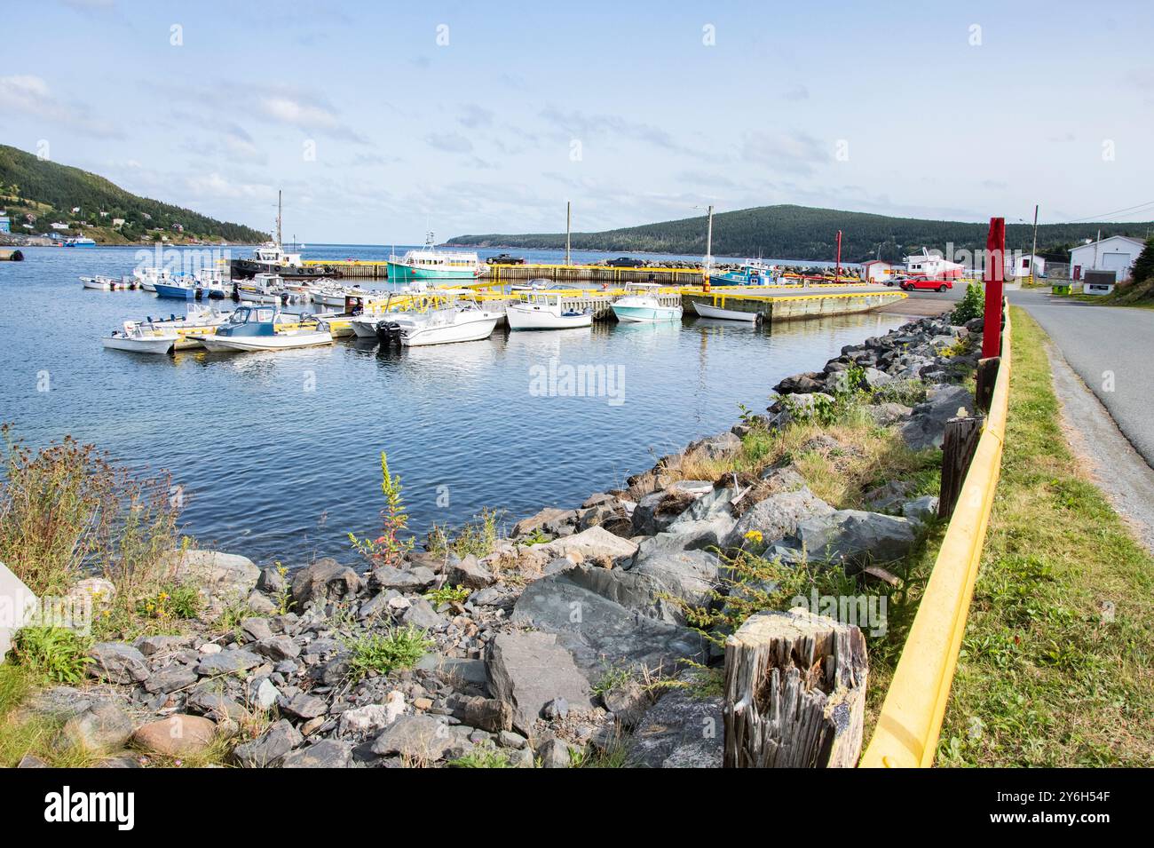 Fishing boats tied up at the floats in the harbor in Bay Bulls, Newfoundland & Labrador, Canada ...