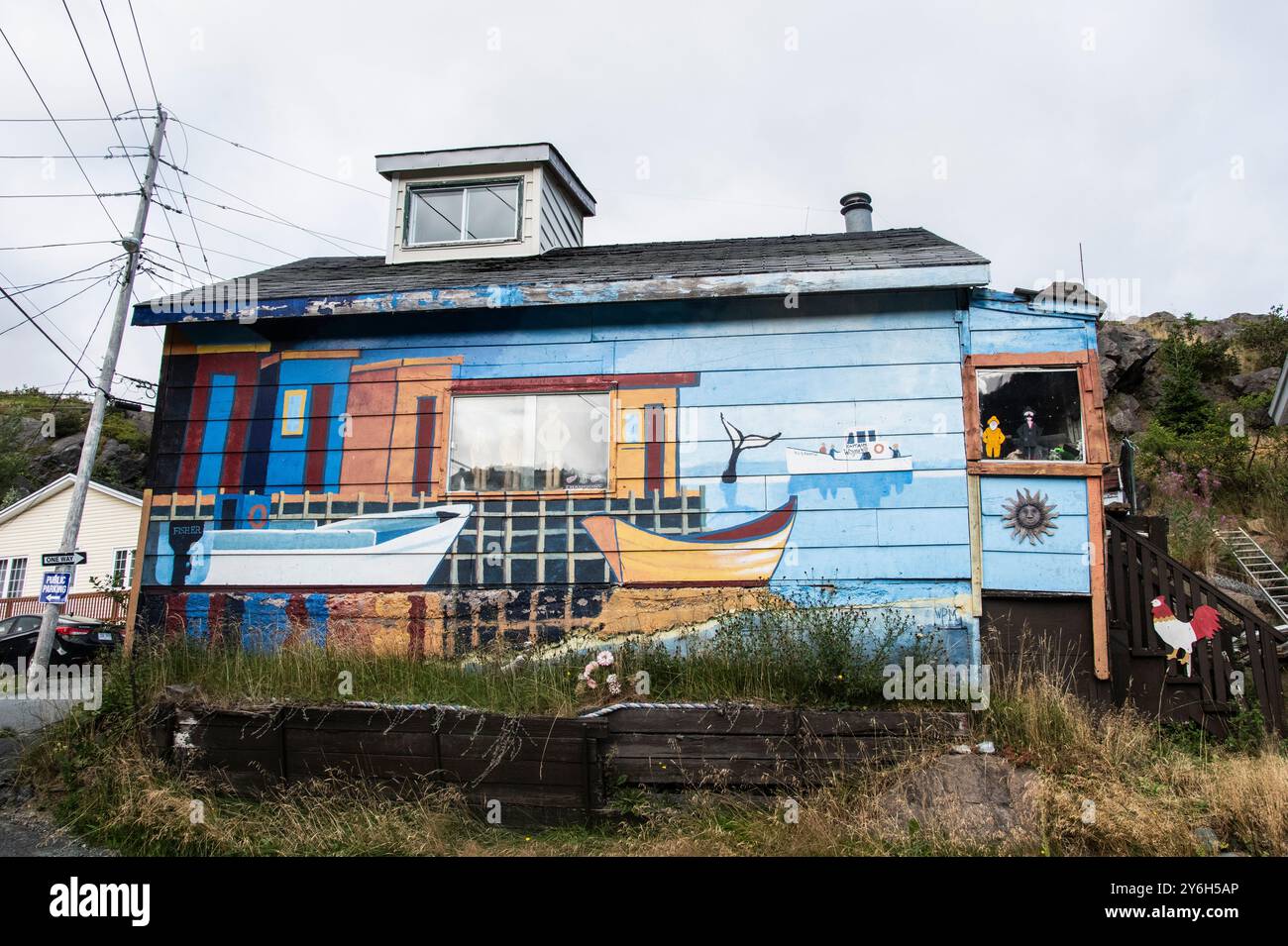 Mural of the harbor on a house in Petty Harbour-Maddox Cove ...