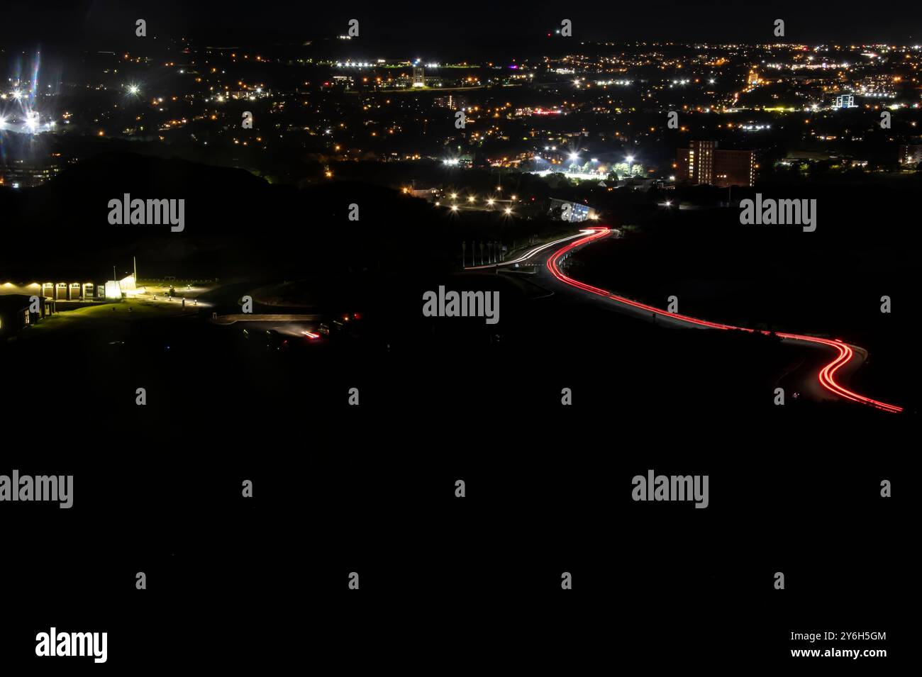 Car trails on Signal Hill Road at night in St. John's, Newfoundland ...