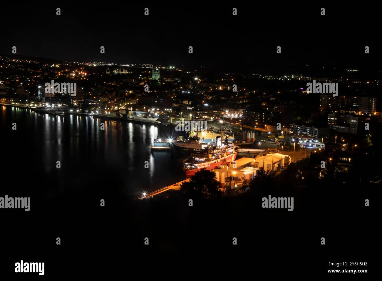 The harbor and downtown at night in St. John's, Newfoundland & Labrador ...