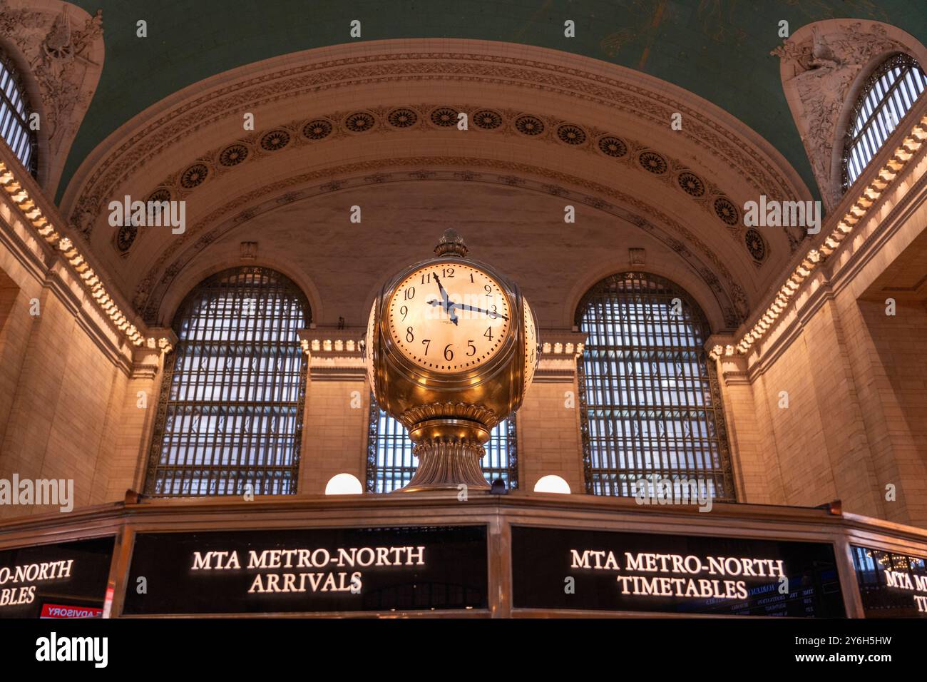 Clock on top of the information booth in the center of the main hall at ...