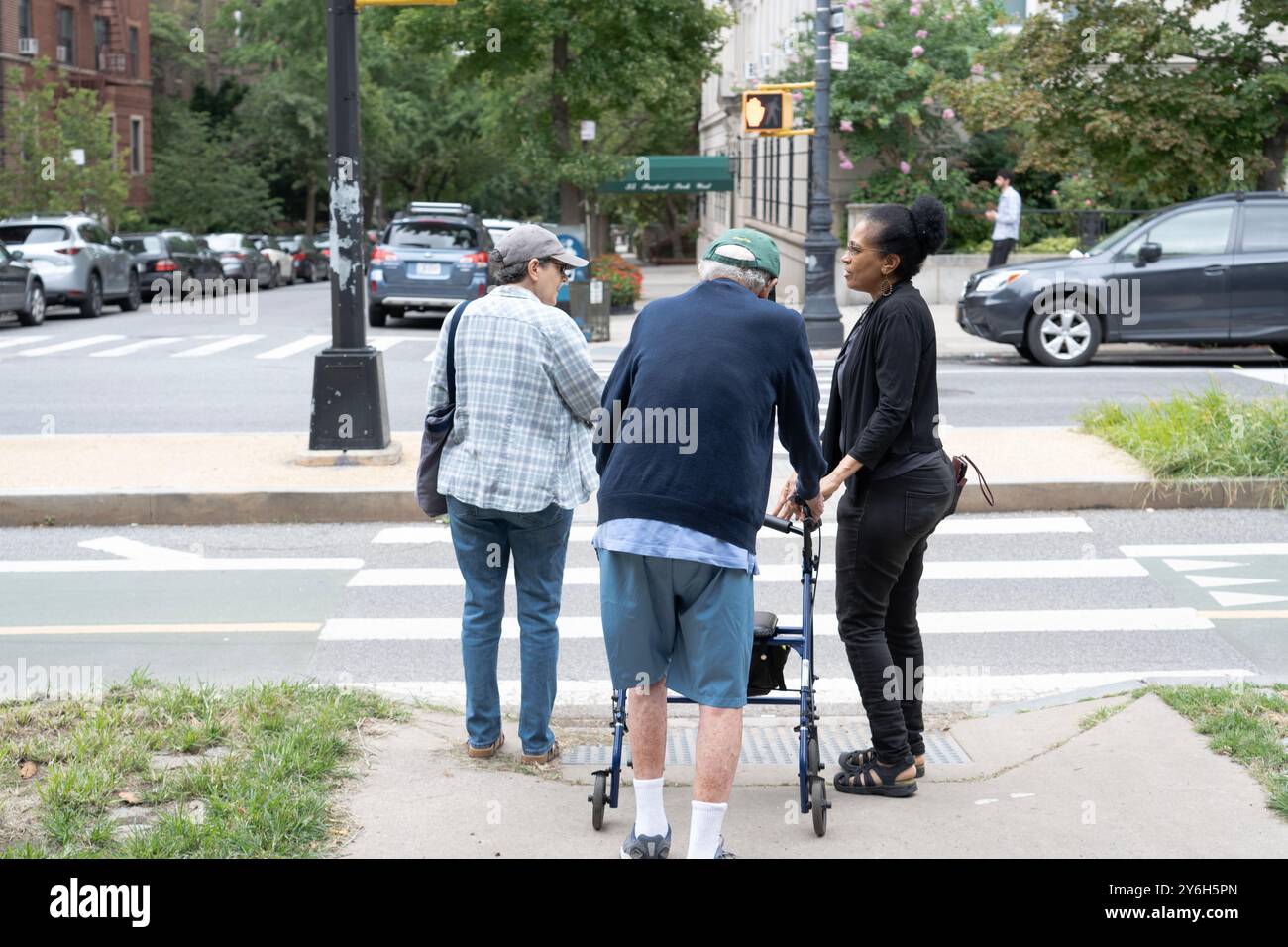 Person being helped in the street hi-res stock photography and images ...