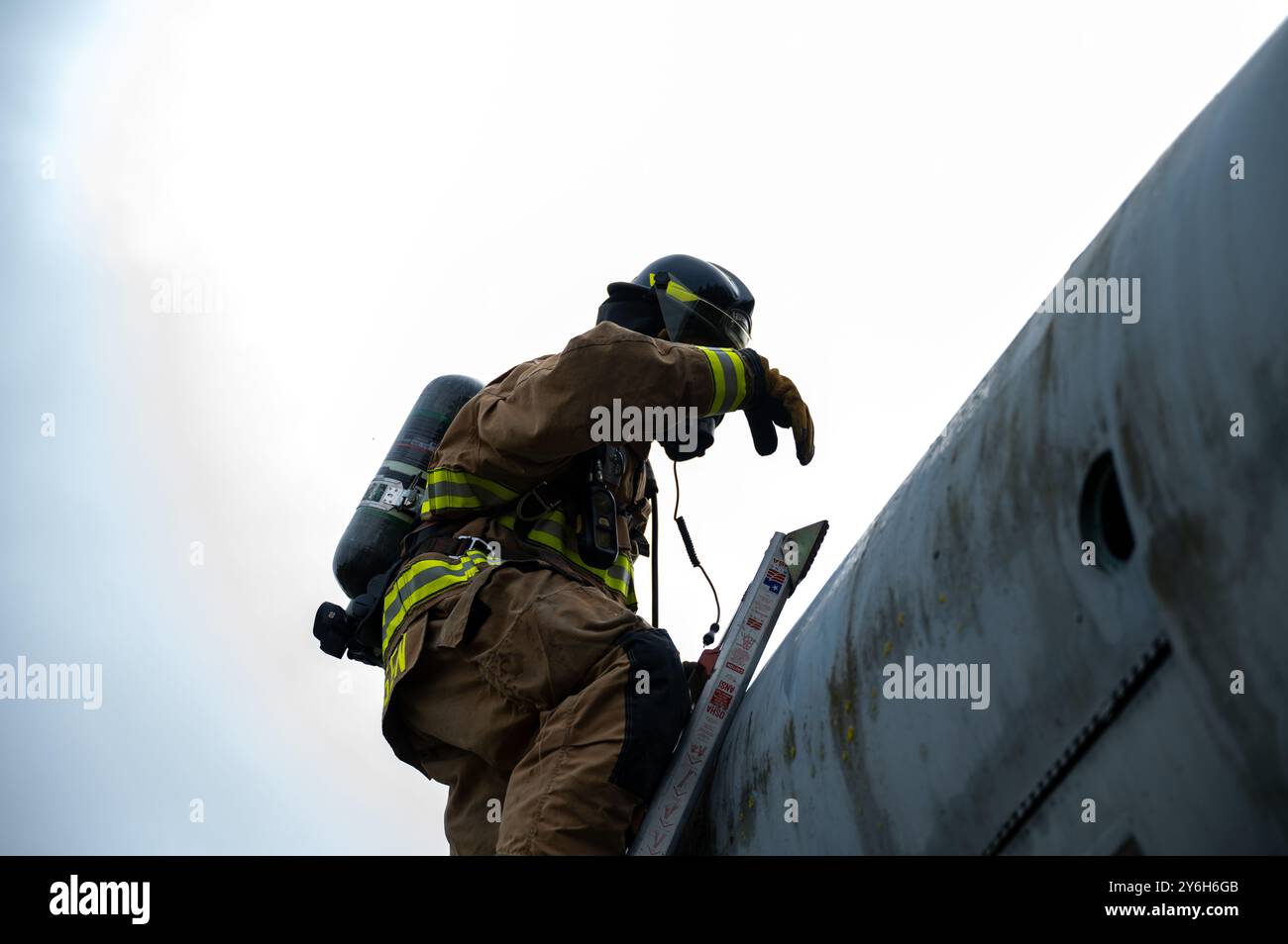 U.S. Air Force Senior Airman Luke Johnsen, a firefighter assigned to ...