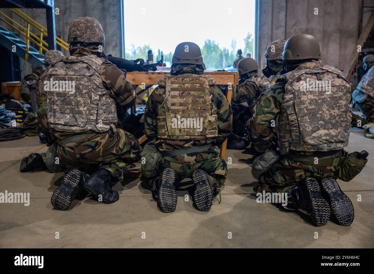 U.S. Air Force Airmen assigned to the 673d Civil Engineer Group take ...