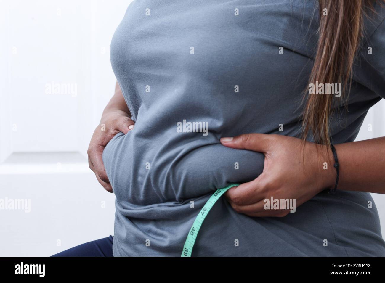 Fat Woman, Fat Belly, Chubby, Obese Woman Hand Holding Excessive Belly ...