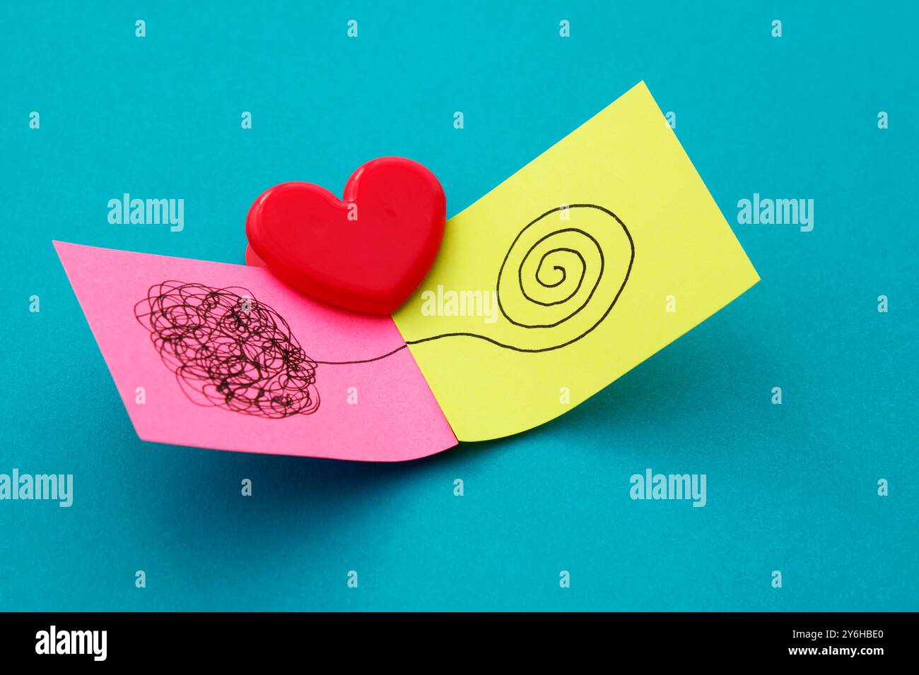 Heart joining colorful notes with a conflicting comment that is ...