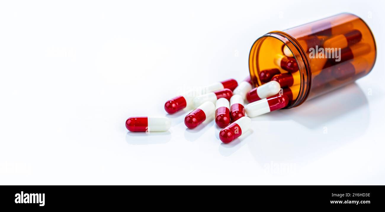 Safety regulated prescription drugs. Capsules pill tumbling from ...