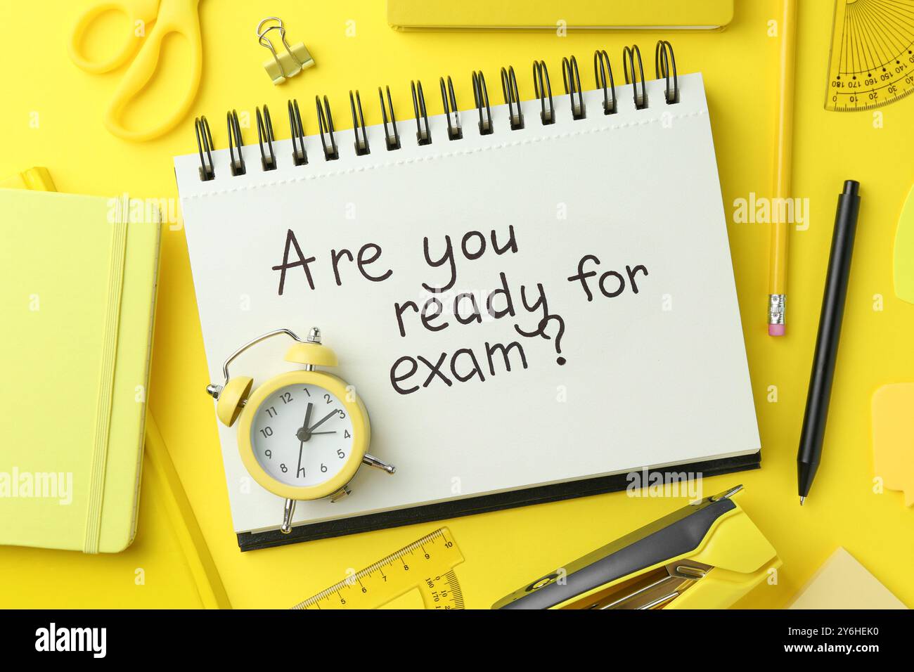 Notepad with question Are You Ready For Exam and stationery on yellow ...
