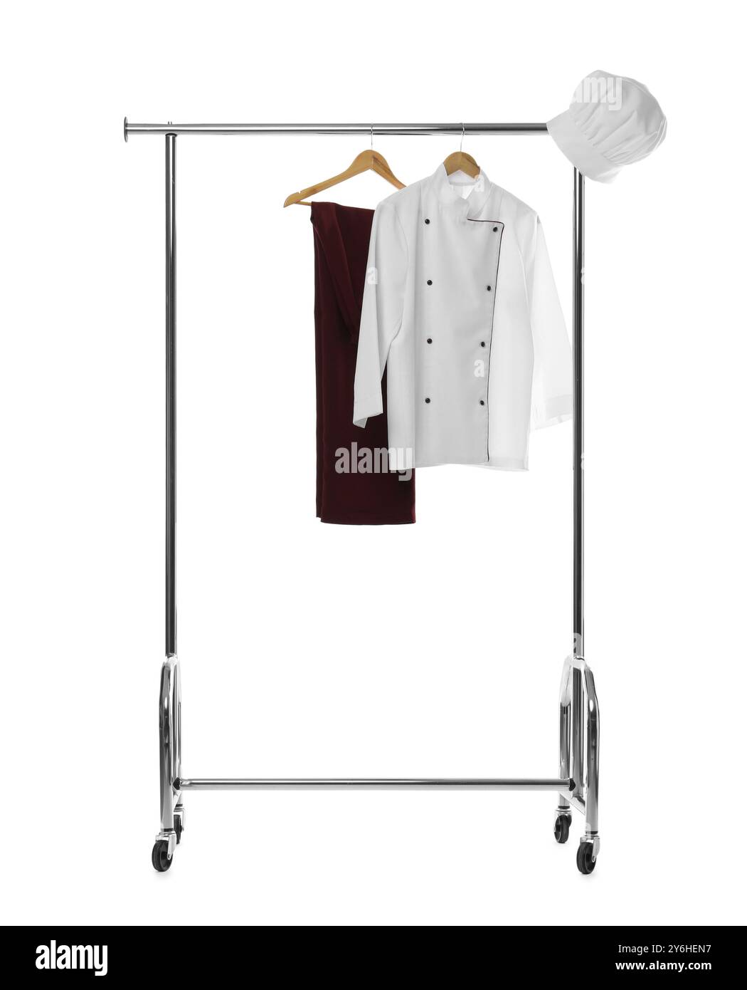 Chef's uniform on clothing rack against white background Stock Photo ...