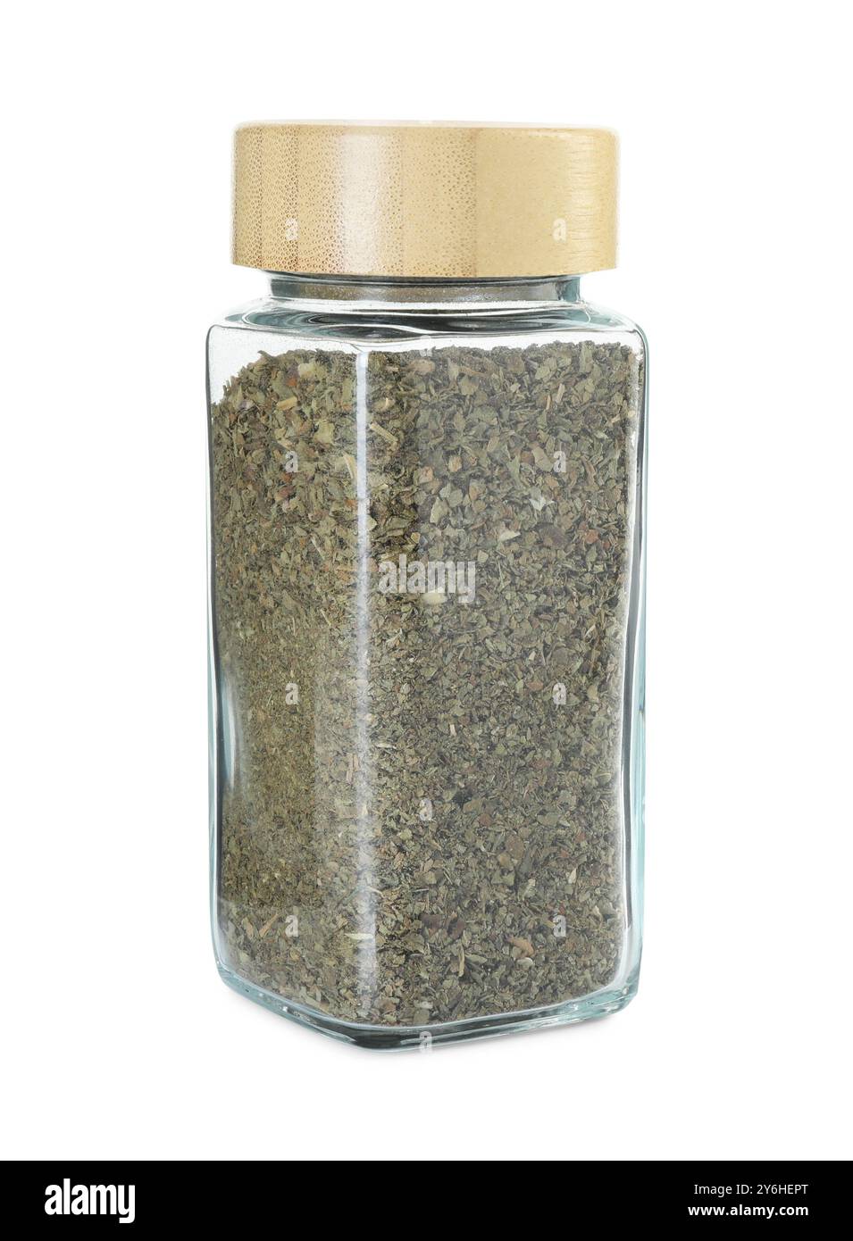 Dry basil in glass jar isolated on white Stock Photo - Alamy