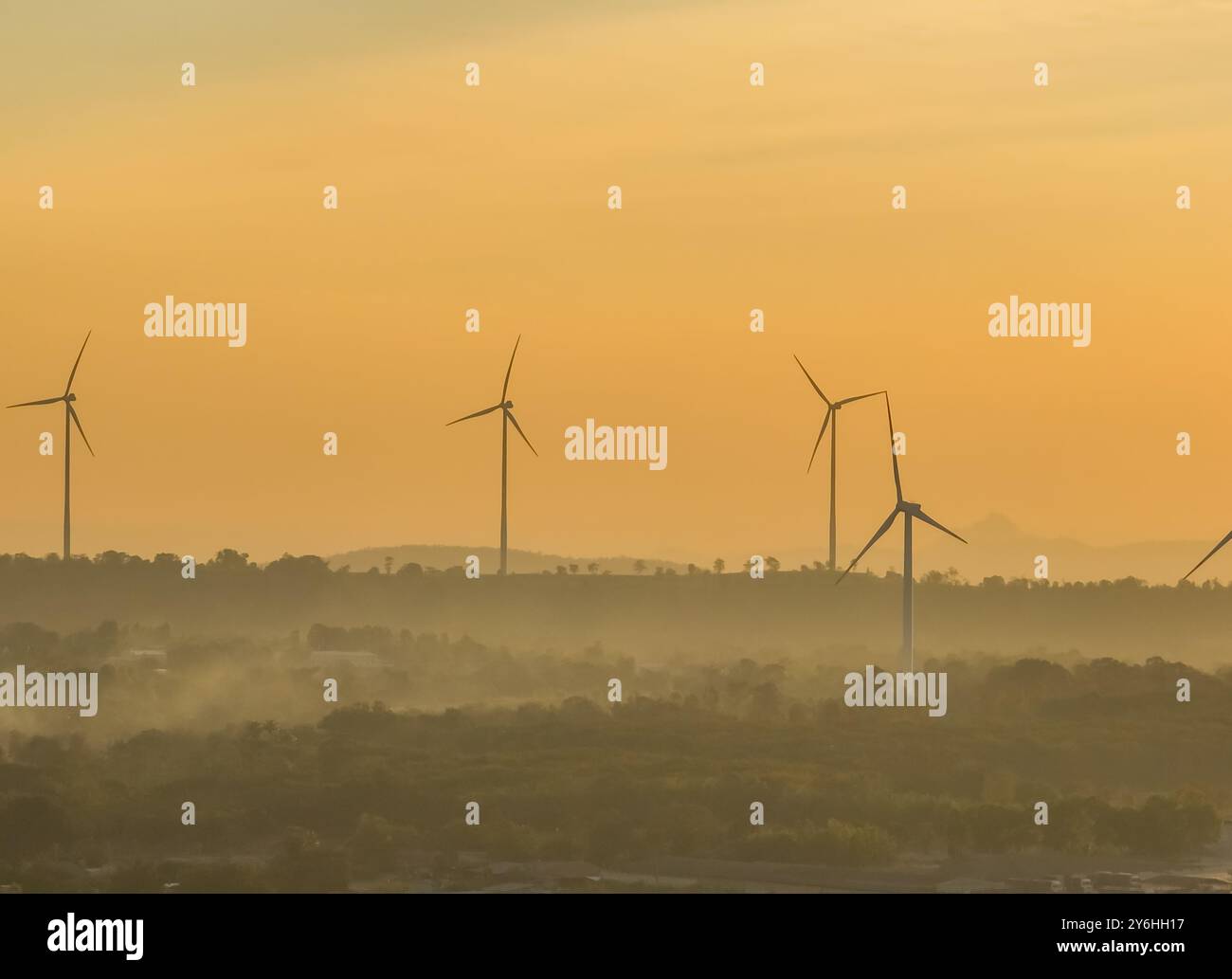 Wind farm field and sunset sky. Wind power. Sustainable, renewable ...