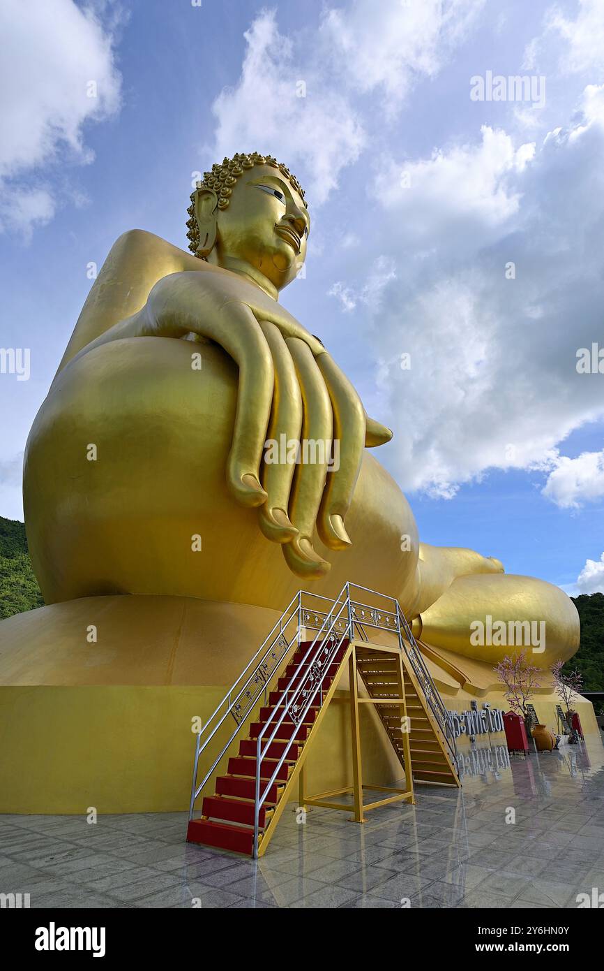 The golden Big Buddha statue at Wat Khao Wong Phrachan, with steps for ...