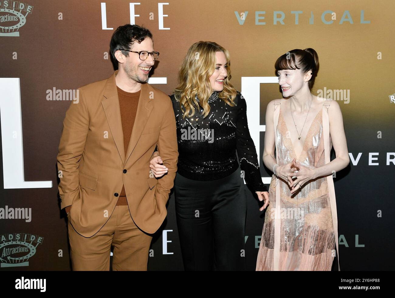Andy Samberg, left, Kate Winslet and Andrea Riseborough attend the ...