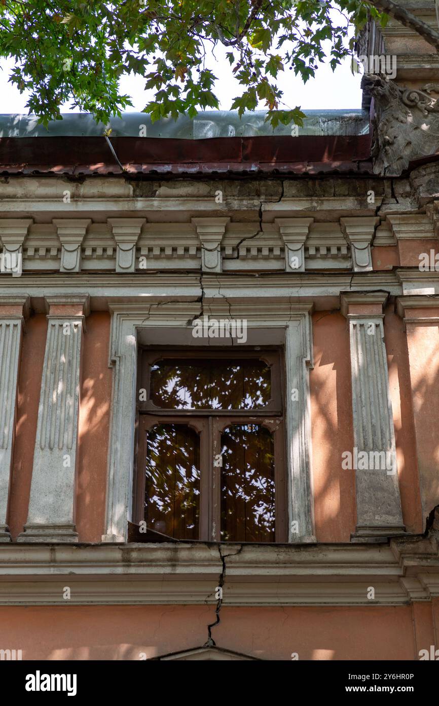 Detail from an ornate shabby style window of a historical building ...