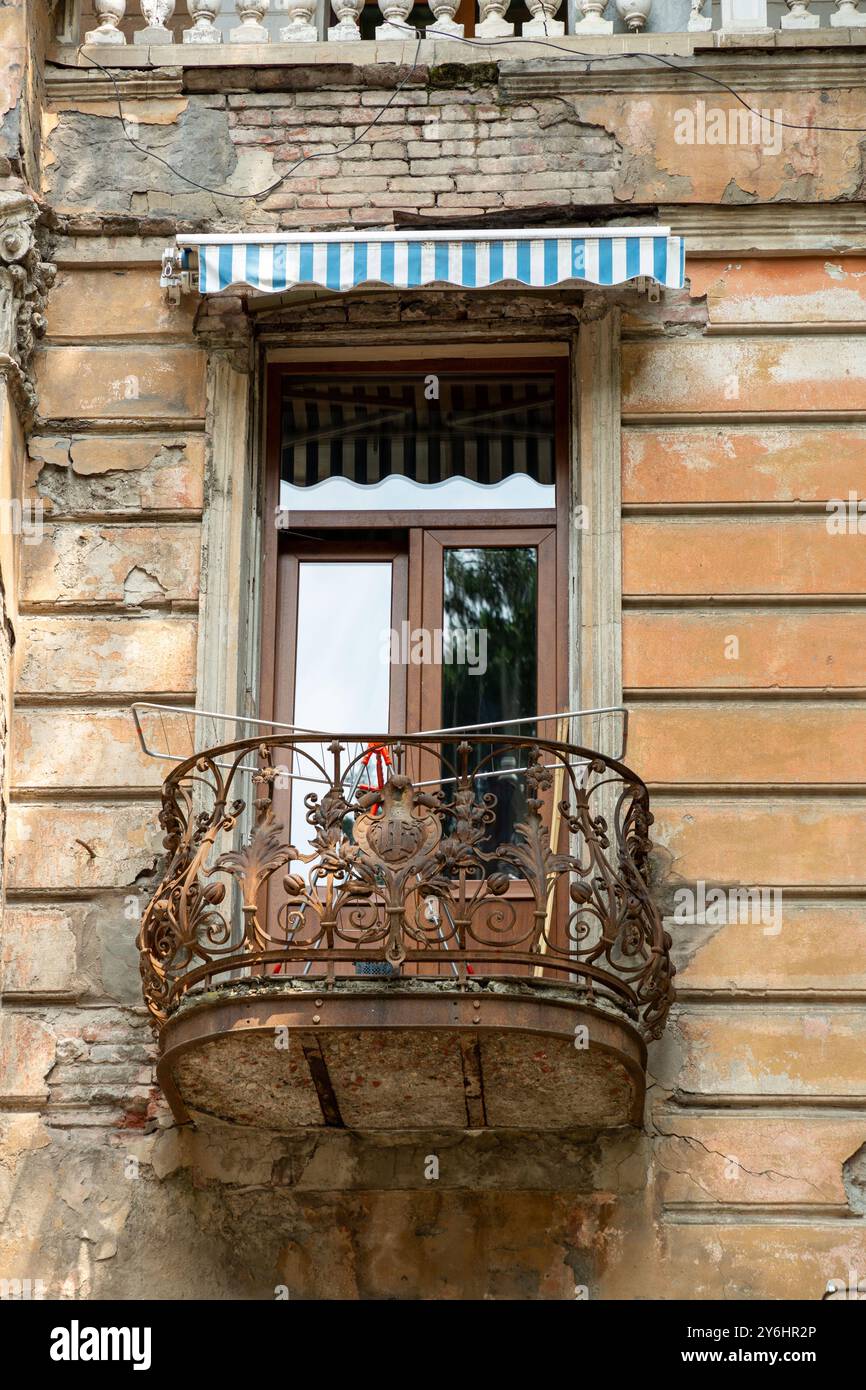 Detail from an ornate shabby style window of a historical building ...