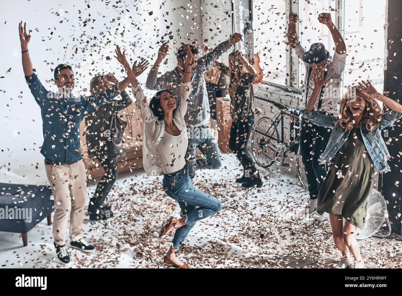 Group young people dancing high hi-res stock photography and images - Alamy