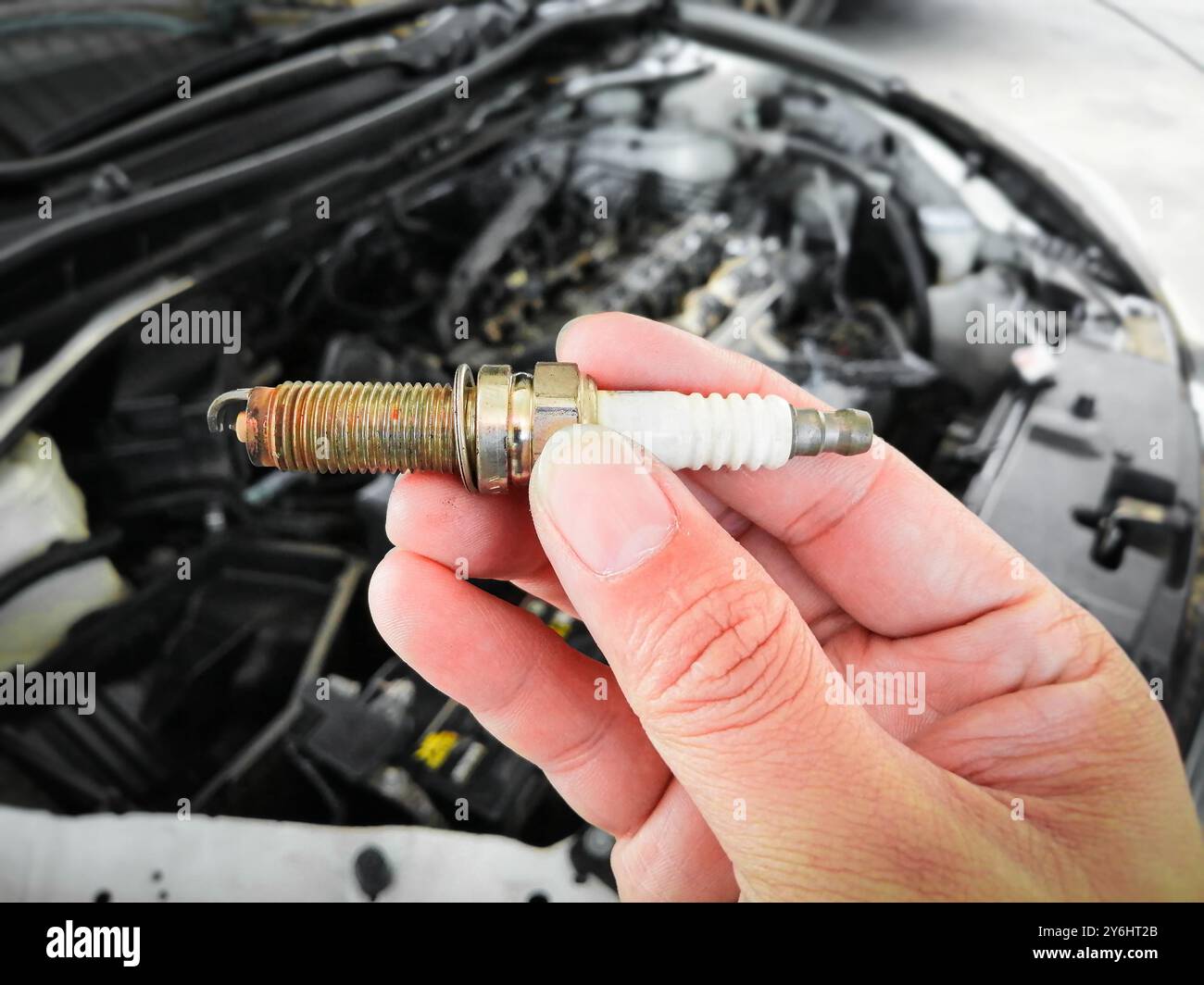 Car spark plug for combustion engine ignition , Car spare parts concept ...