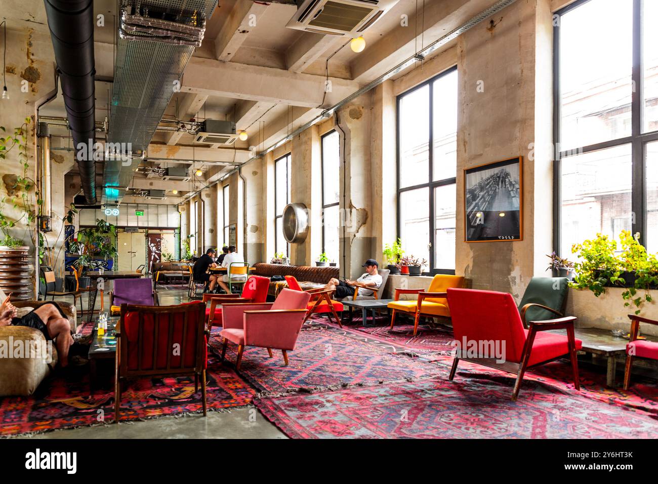 Tbilisi, Georgia - 10 AUG, 2024: Interior of the Fabrika Hostel, an ex ...