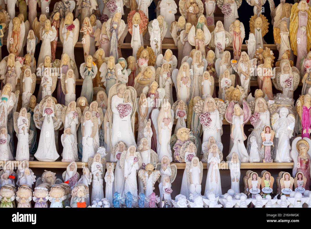 Small cast plaster figures of people Stock Photo - Alamy