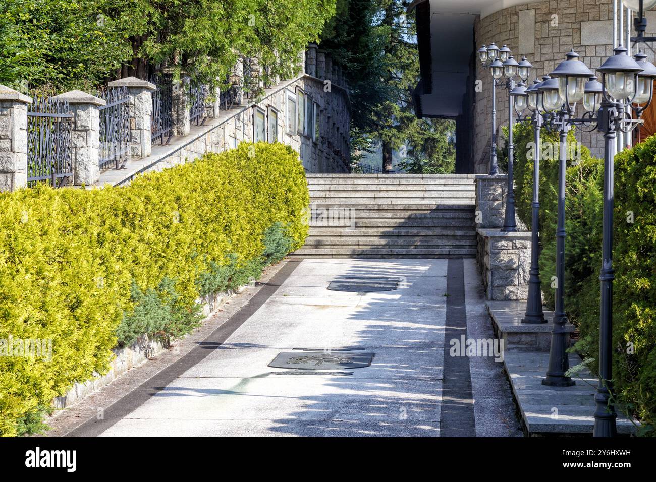 a garden in a park with lanterns and stone-tiled steps Stock Photo - Alamy