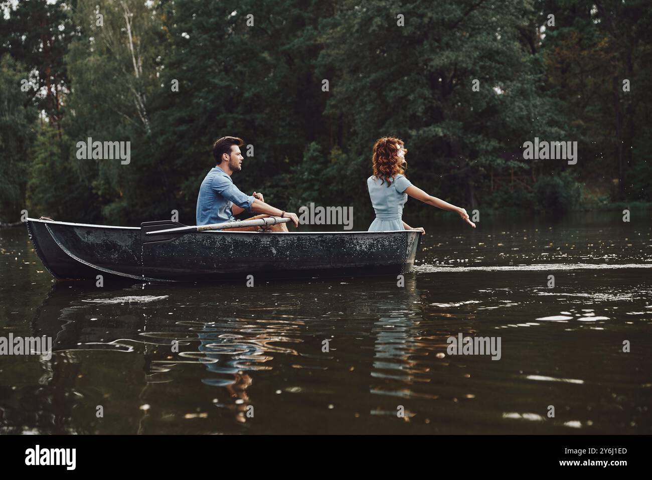 Young and free. Beautiful young couple enjoying romantic date while ...