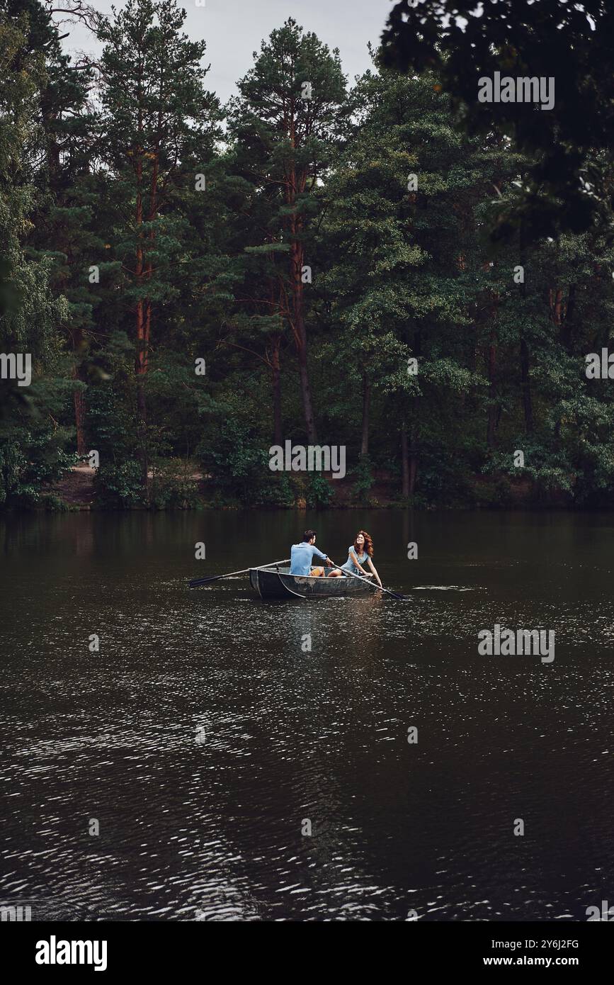 Happy moments together. Beautiful young couple enjoying romantic date ...