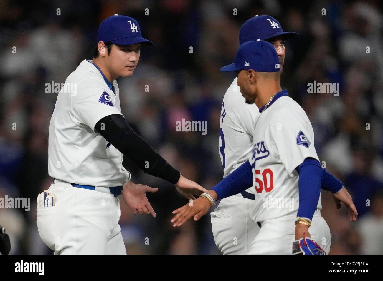 Los Angeles Dodgers designated hitter Shohei Ohtani, left, and right ...