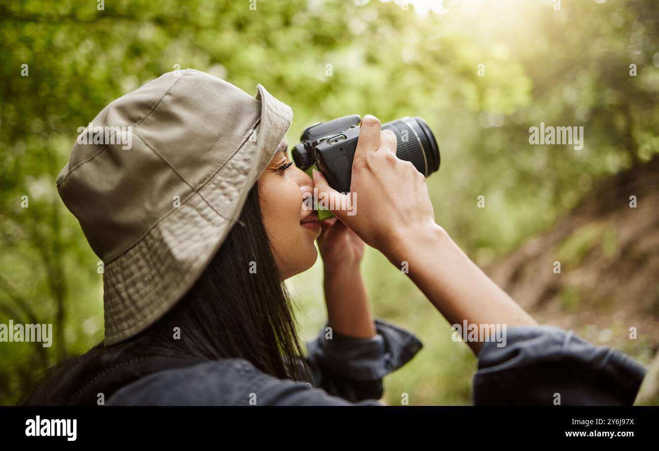 Woman, photographer and camera to explore forest, hiking and jungle for travel journalism ...