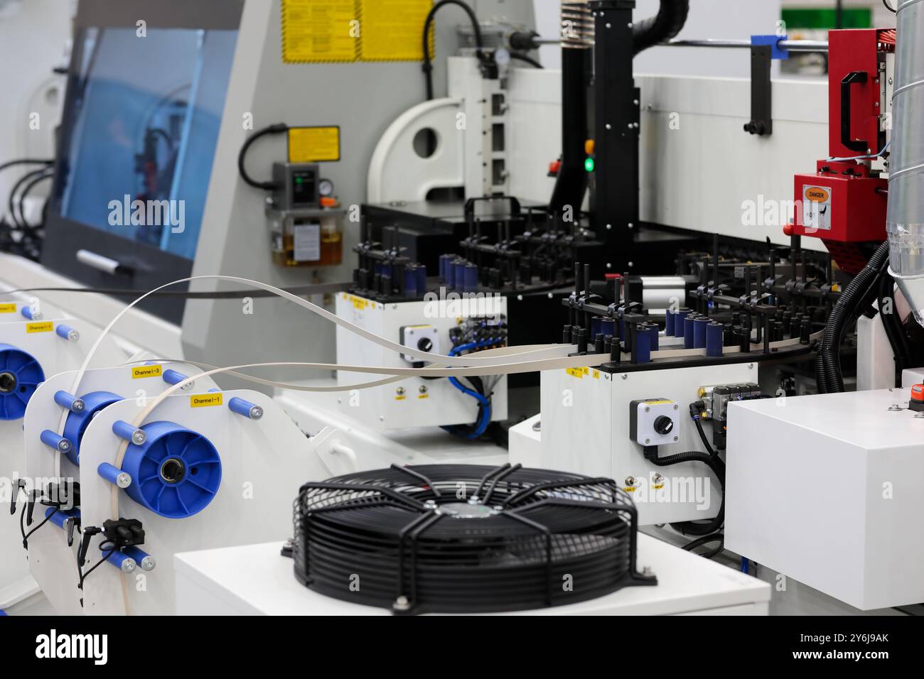 Automatic high speed laser edge banding machine. Selective focus Stock ...